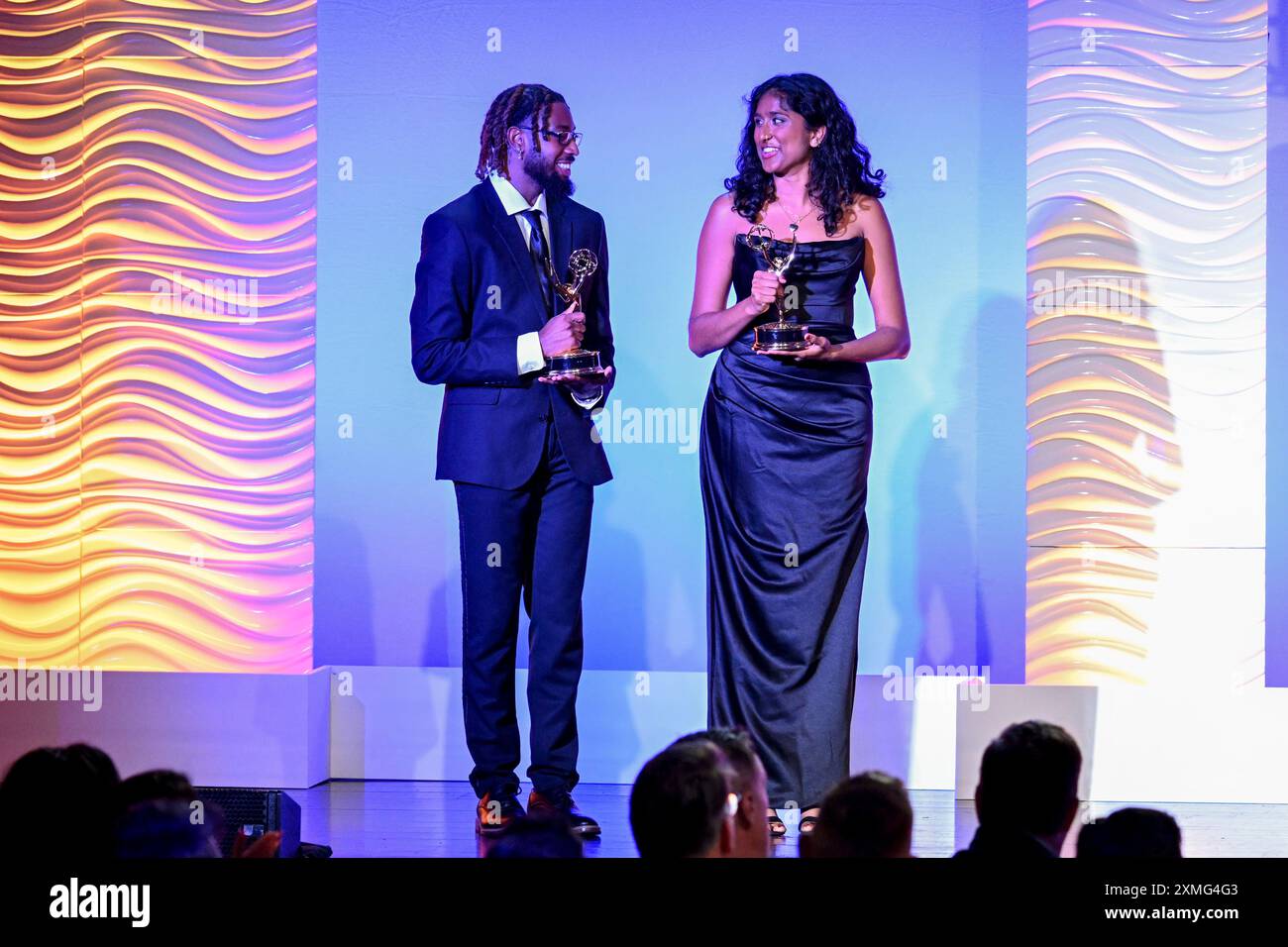 Miykael Stith and Geethika Kataru on stage at the 76th L.A. Area Emmy ...