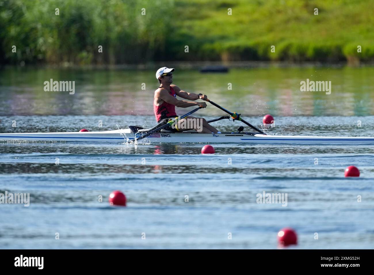 Andre Matias, of Angola, competes in men's single scull rowing ...