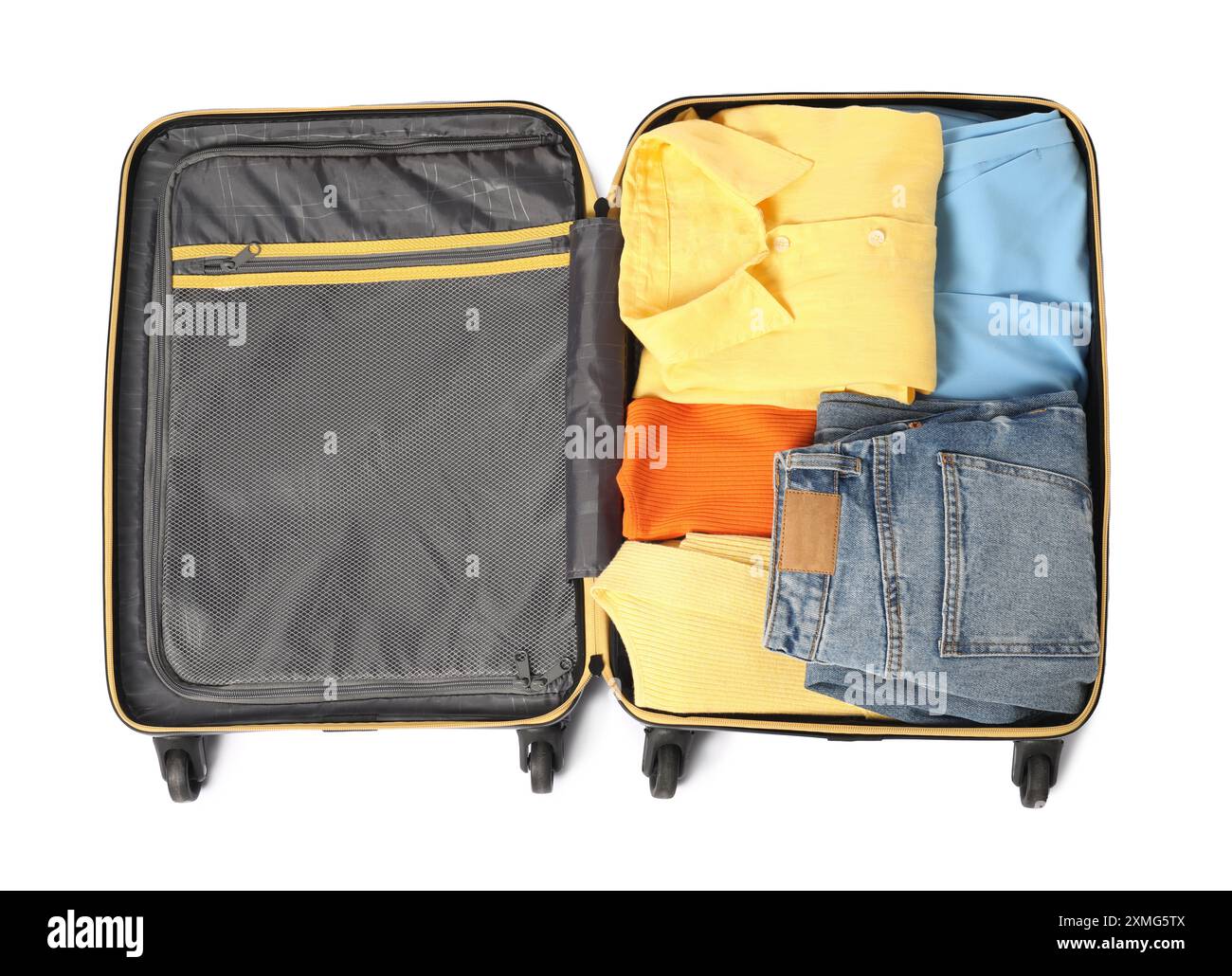 Open suitcase with clothes packed for travelling isolated on white, top ...