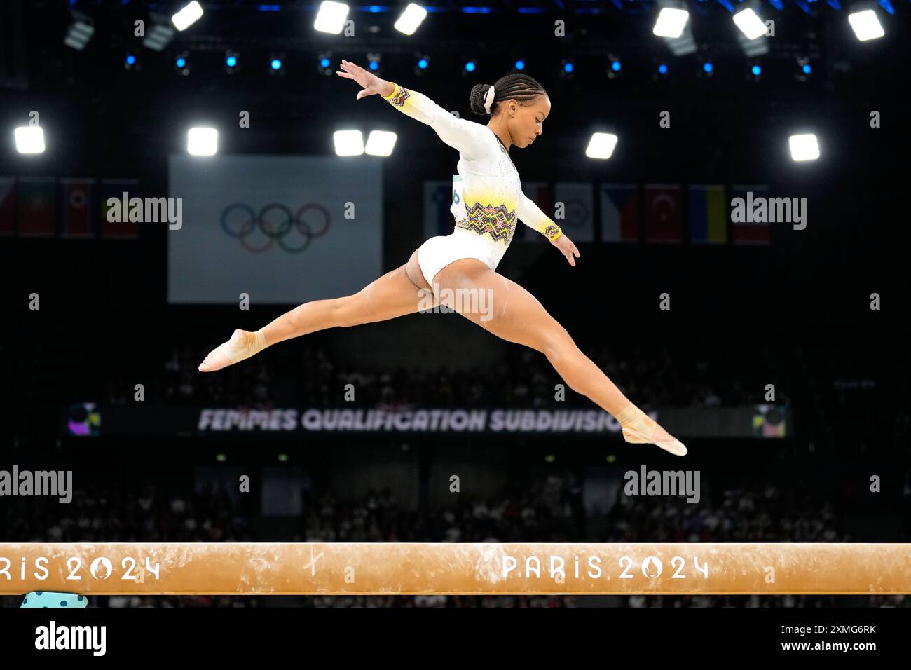 Caitlin Rooskrantz, of South Africa, competes on the balance beam ...