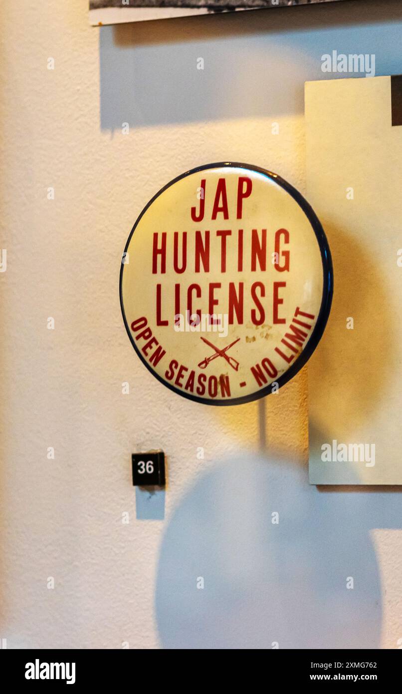 Los Angeles, USA. 27th July, 2024. A "hunting license" button from 1942 ...