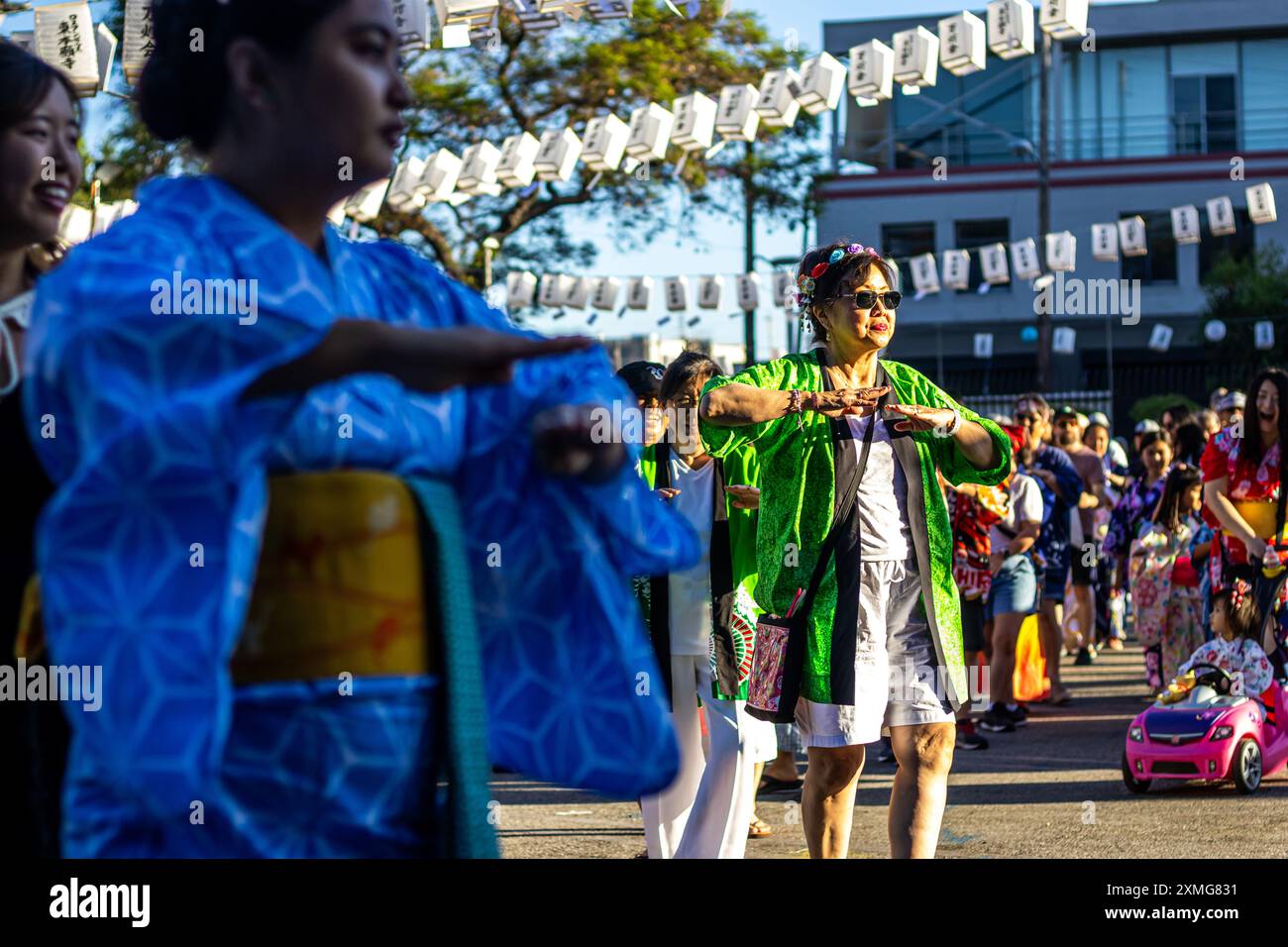 Los Angeles, USA. 27th July, 2024. Women wearing kimonos dancing Bon Odori at Higashi Obon ...