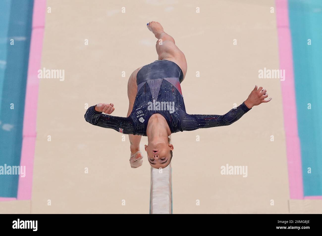 Alice Kinsella, of Great Britain, competes on the balance beam during a ...
