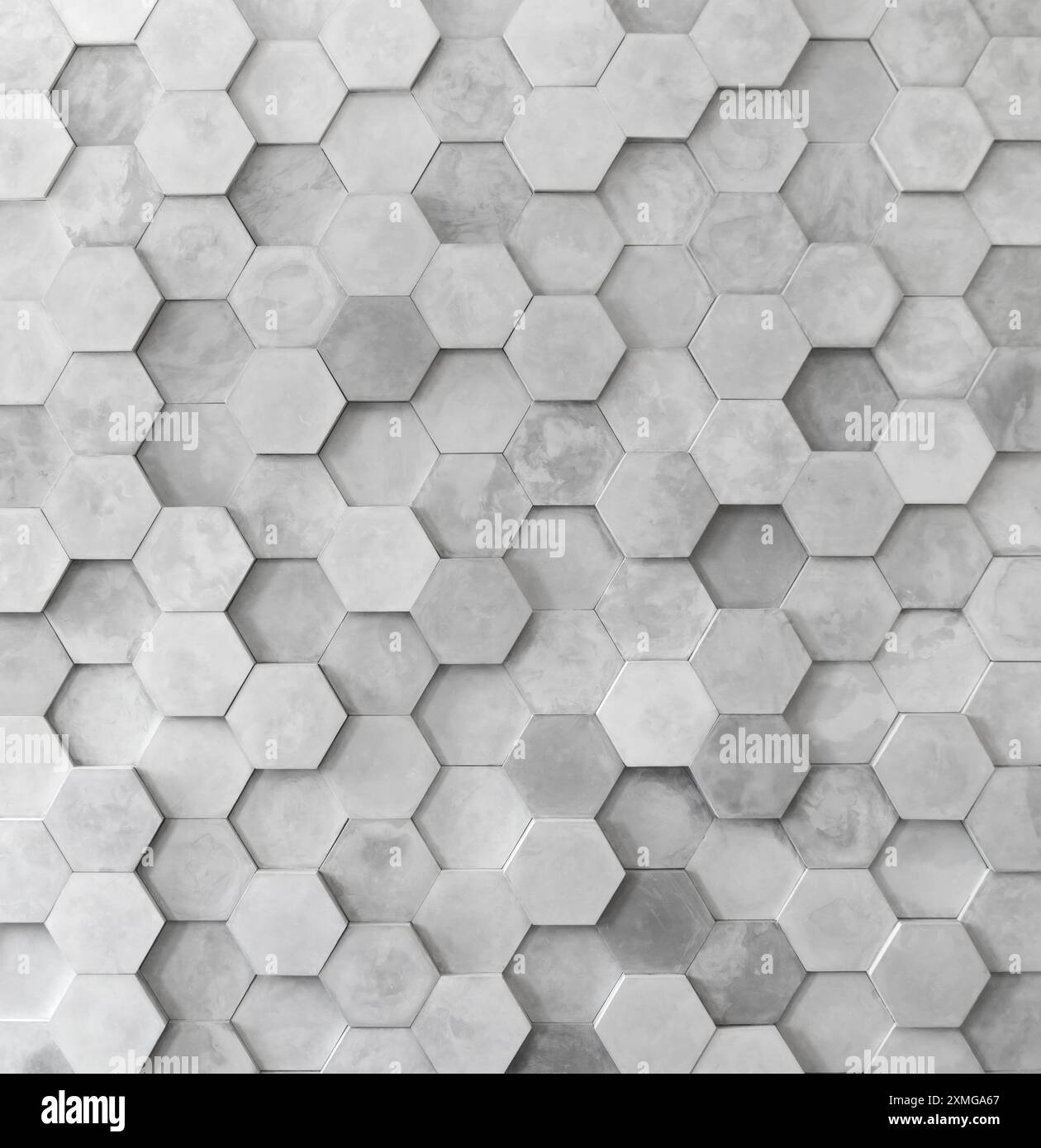 Grey wall background featuring 3D hexagonal tiles arranged in a geometric diamond pattern ...