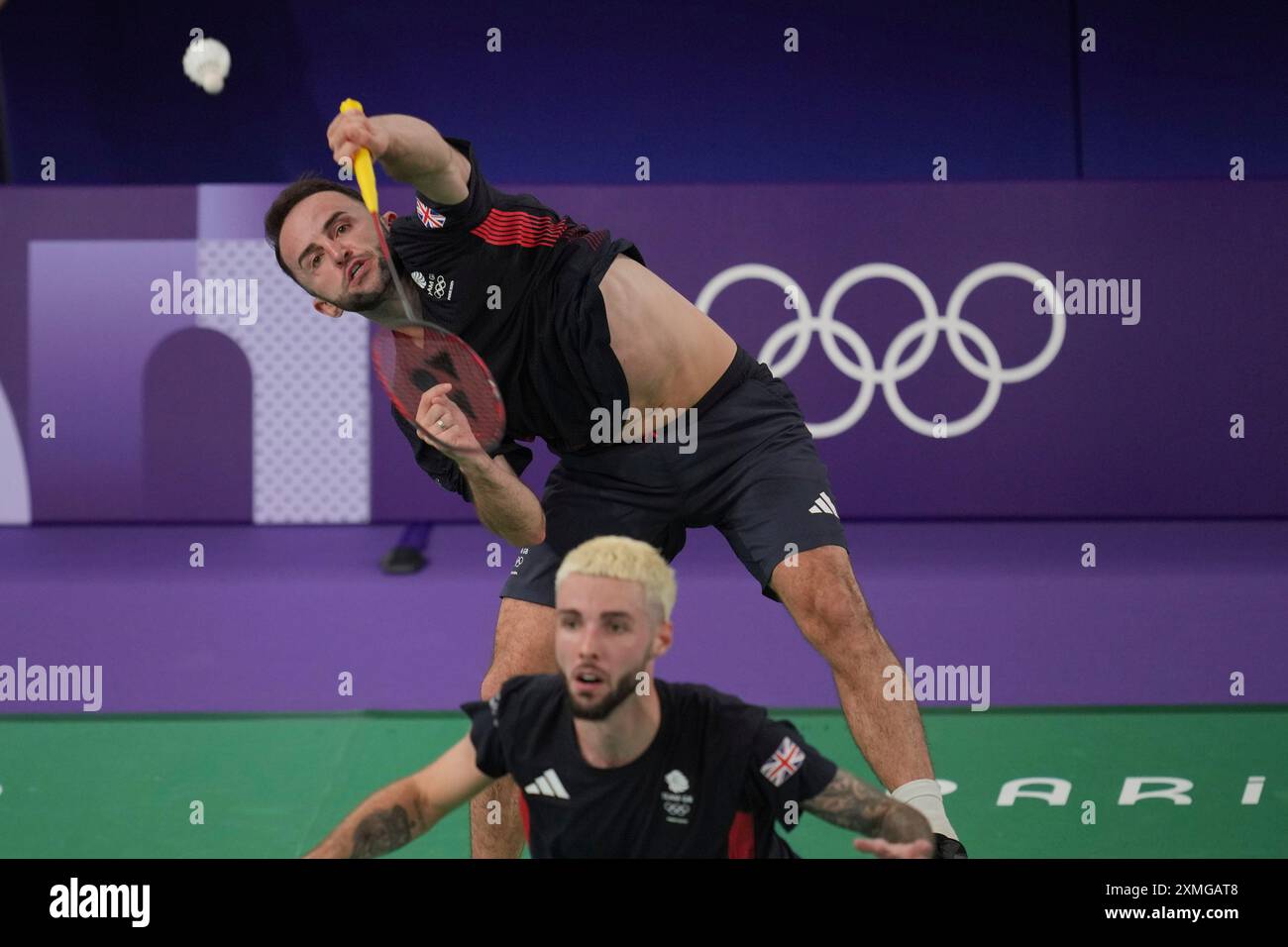 Britain's Ben Lane, top, and Sean Vendy play against China's Liang ...