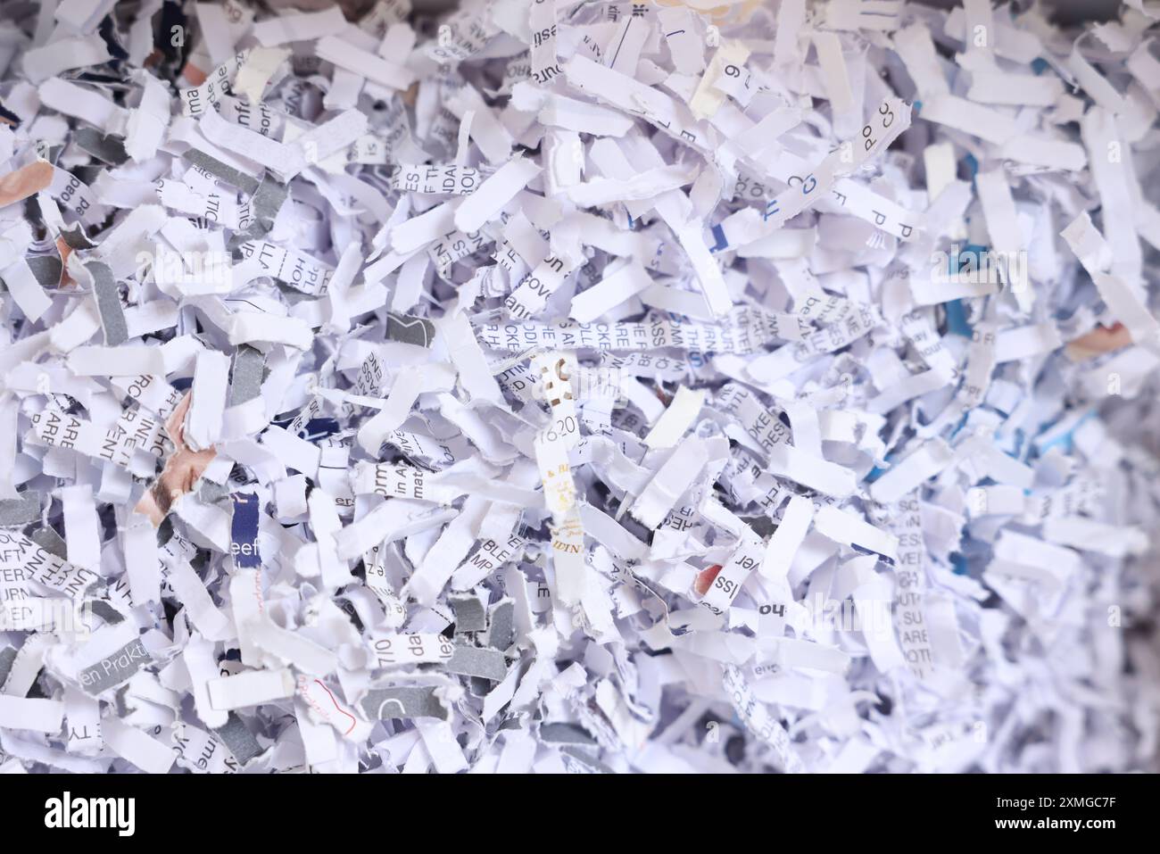 Pile of shredded paper strips, closeup view Stock Photo - Alamy