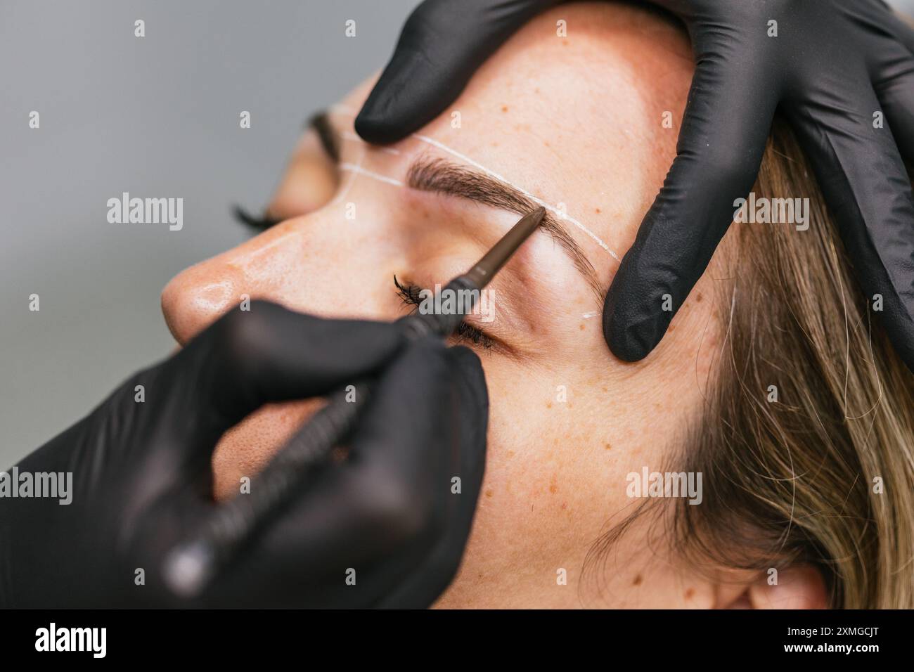 Preparing for microblading, precise eyebrow design and makeup ...