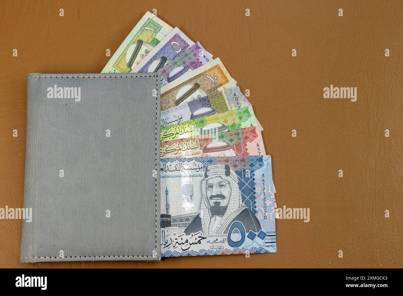 Saudi Arabia money in a notebook with copy space Stock Photo - Alamy
