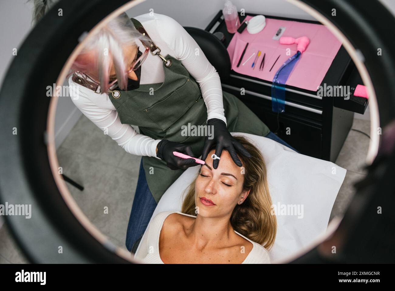 Microblading eyebrow tattoo procedure in hi-res stock photography and ...