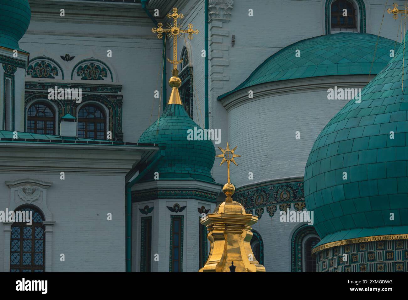 Close-up view of golden and green domes of an Orthodox cathedral with ...