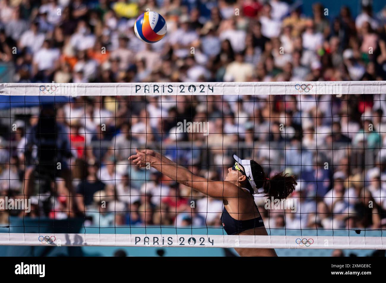 Italy's Marta Menegatti reaches the ball in the women's pool A beach ...