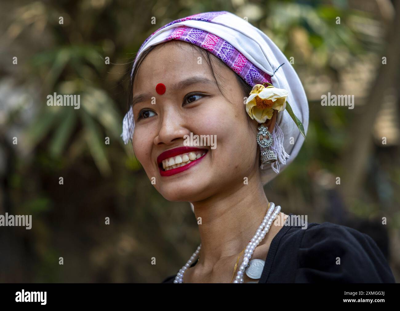 Chakma young woman in traditional clothing celebrating Biju festival ...
