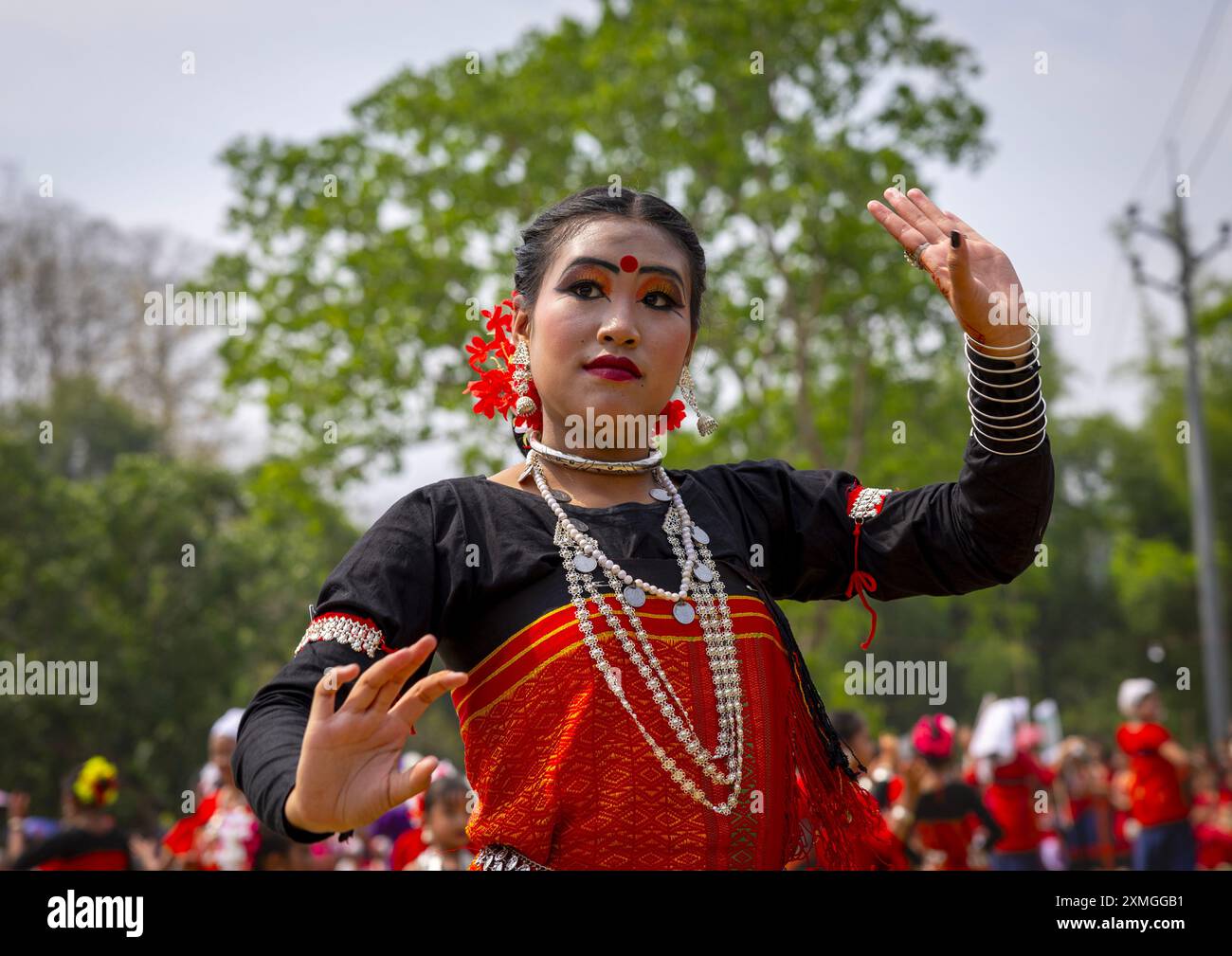 Chakma young woman in traditional clothing celebrating Biju festival ...