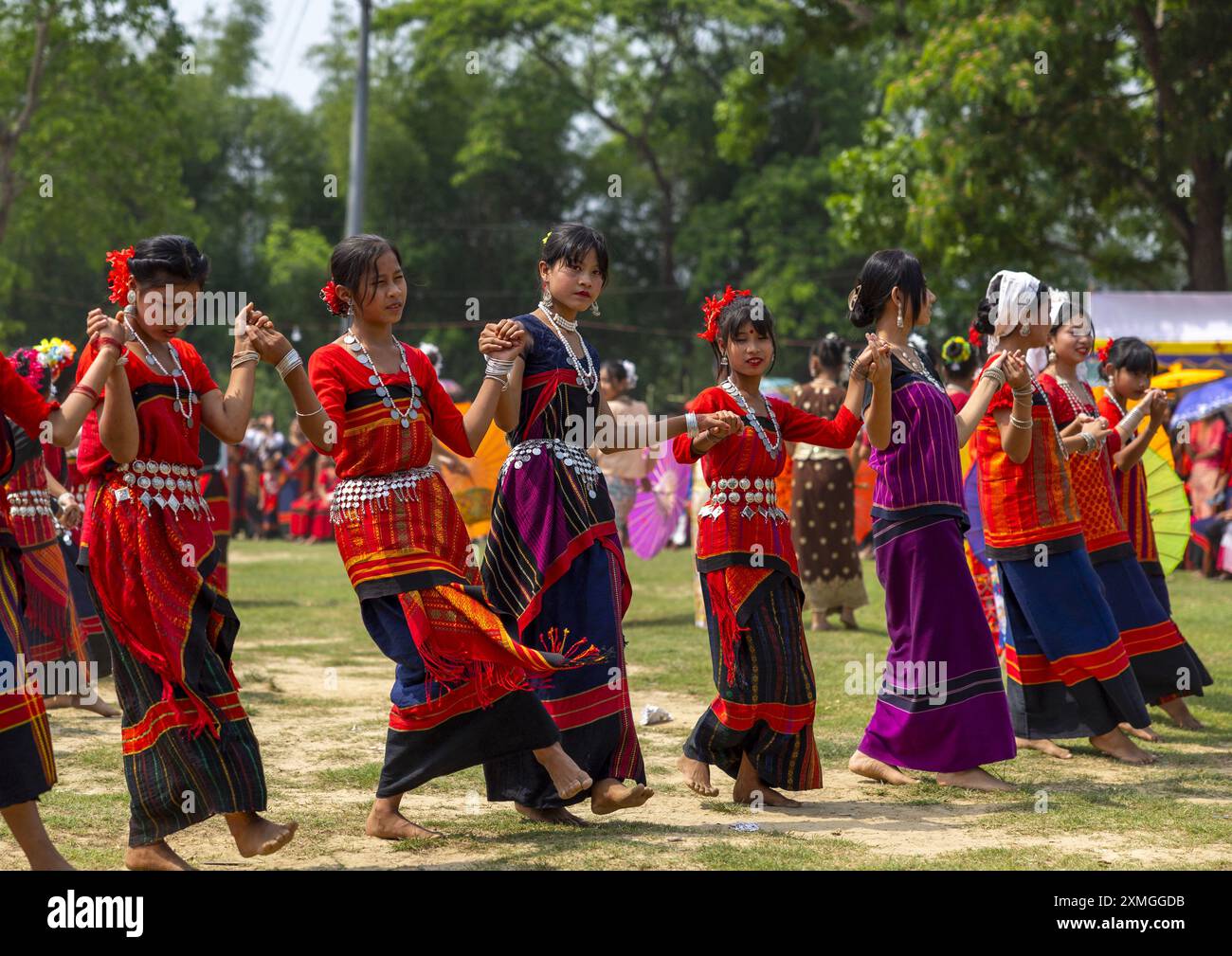 Chakma women in traditional clothing celebrating Biju festival ...