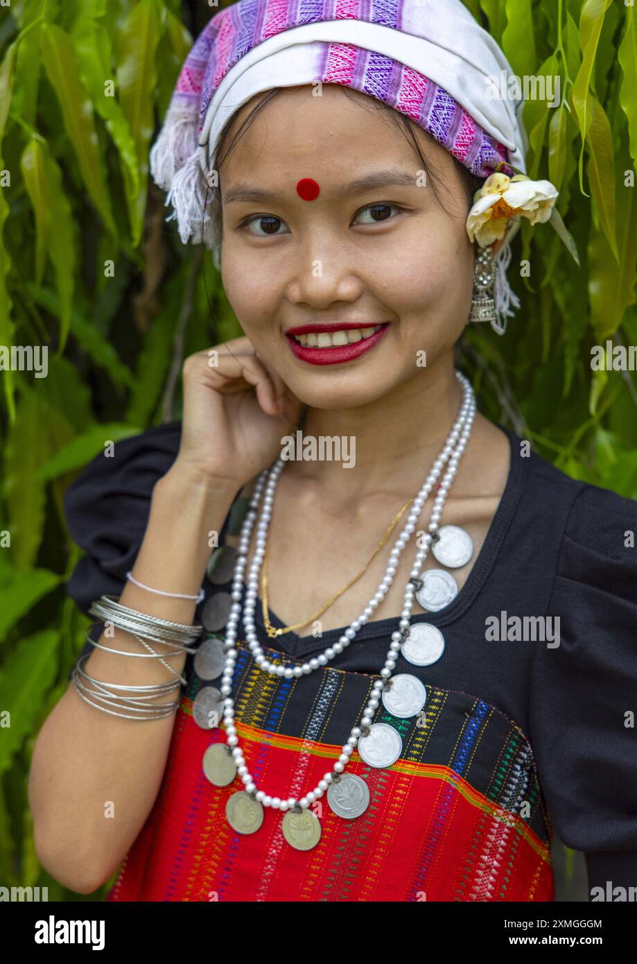 Chakma young woman in traditional clothing celebrating Biju festival, Chittagong Division ...