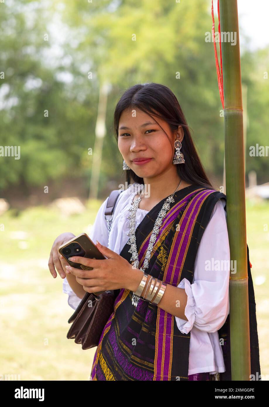 Chakma young woman in traditional clothing celebrating Biju festival ...