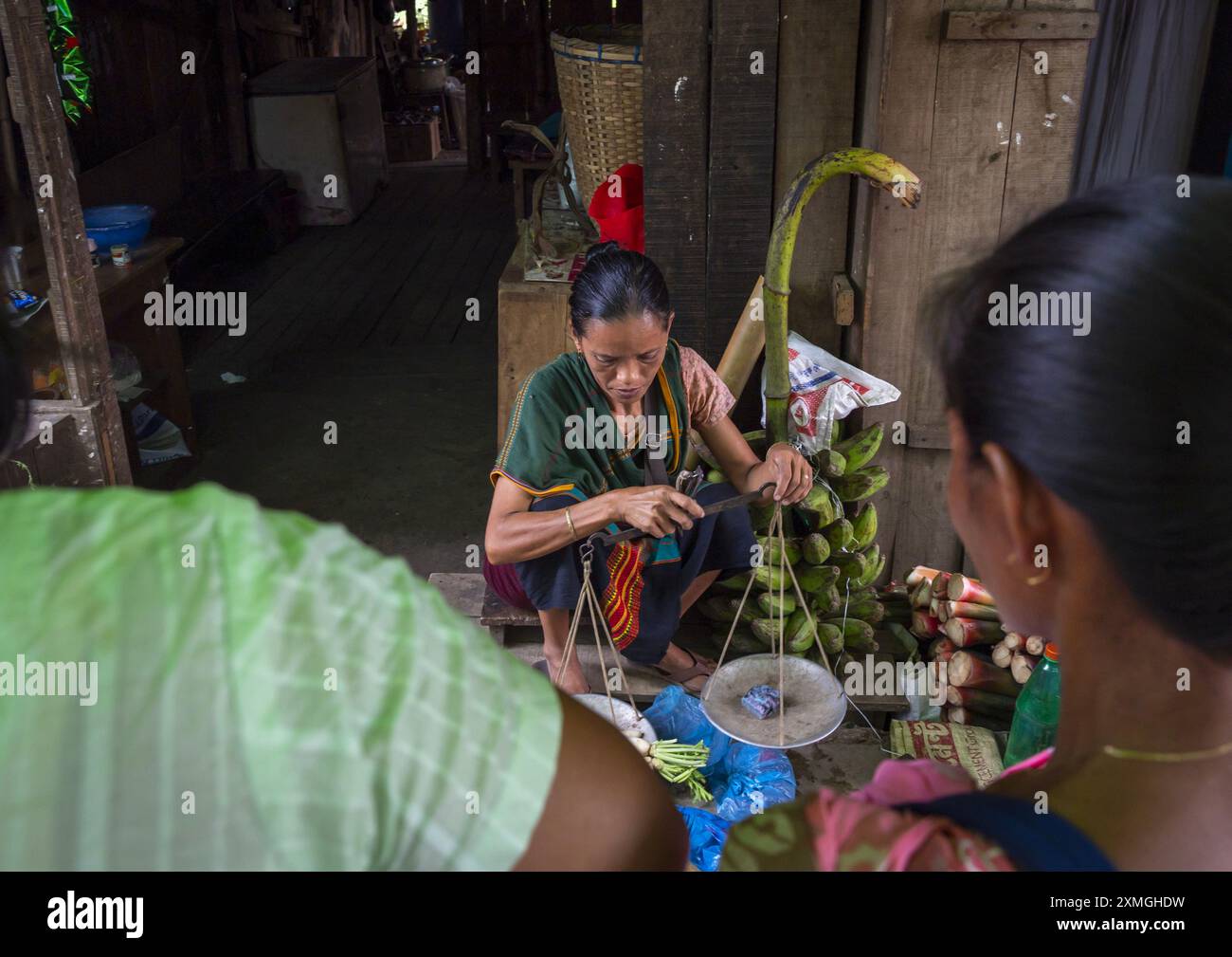 Chakma tribe woman selling vegetables at market, Chittagong Division ...