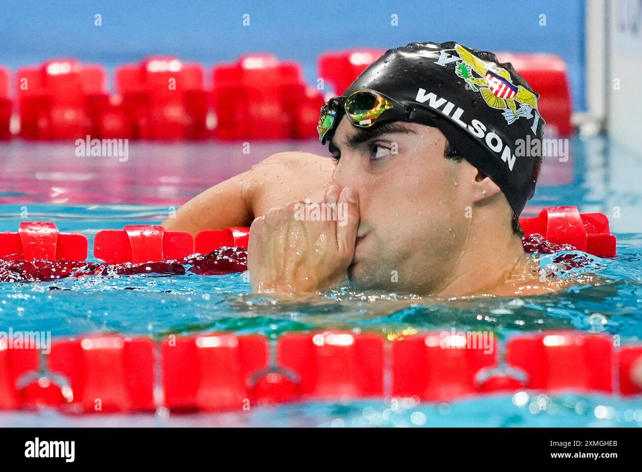 Maximillian Wilson, of the US Virgin Islands, reacts after competing in ...