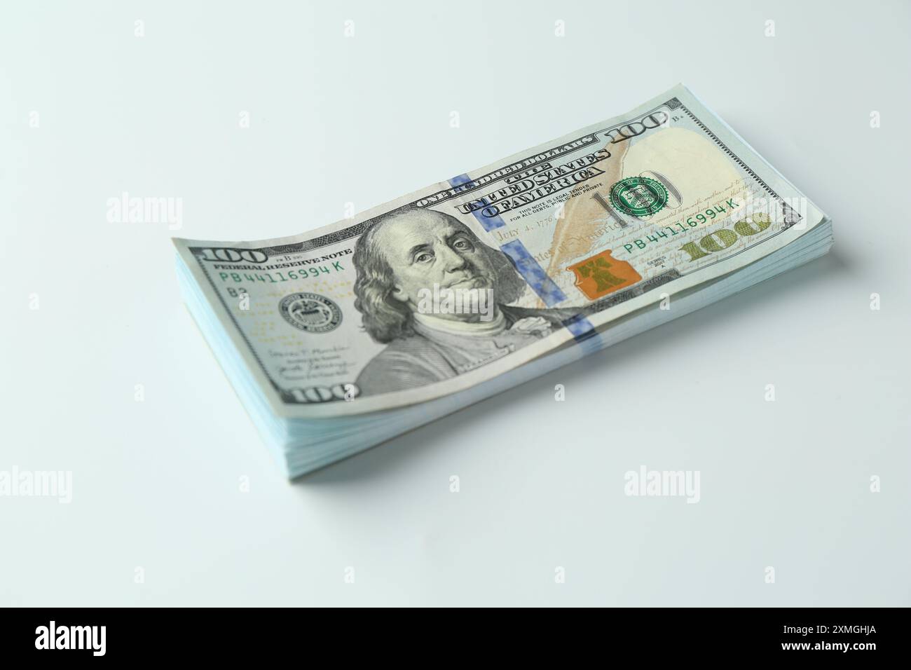 Stack of dollar banknotes on white background Stock Photo - Alamy