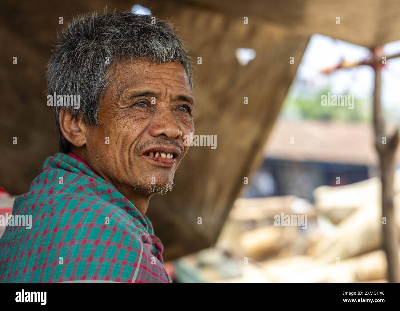 Portrait of a bangladeshi Chakma tribe man looking away, Chittagong ...