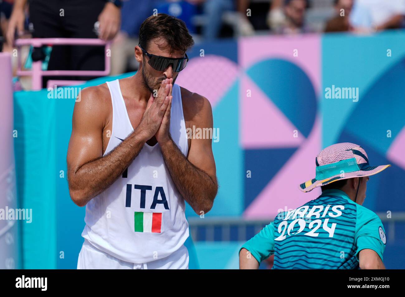Italy's Alex Ranghieri reacts in a beach volleyball match against The ...