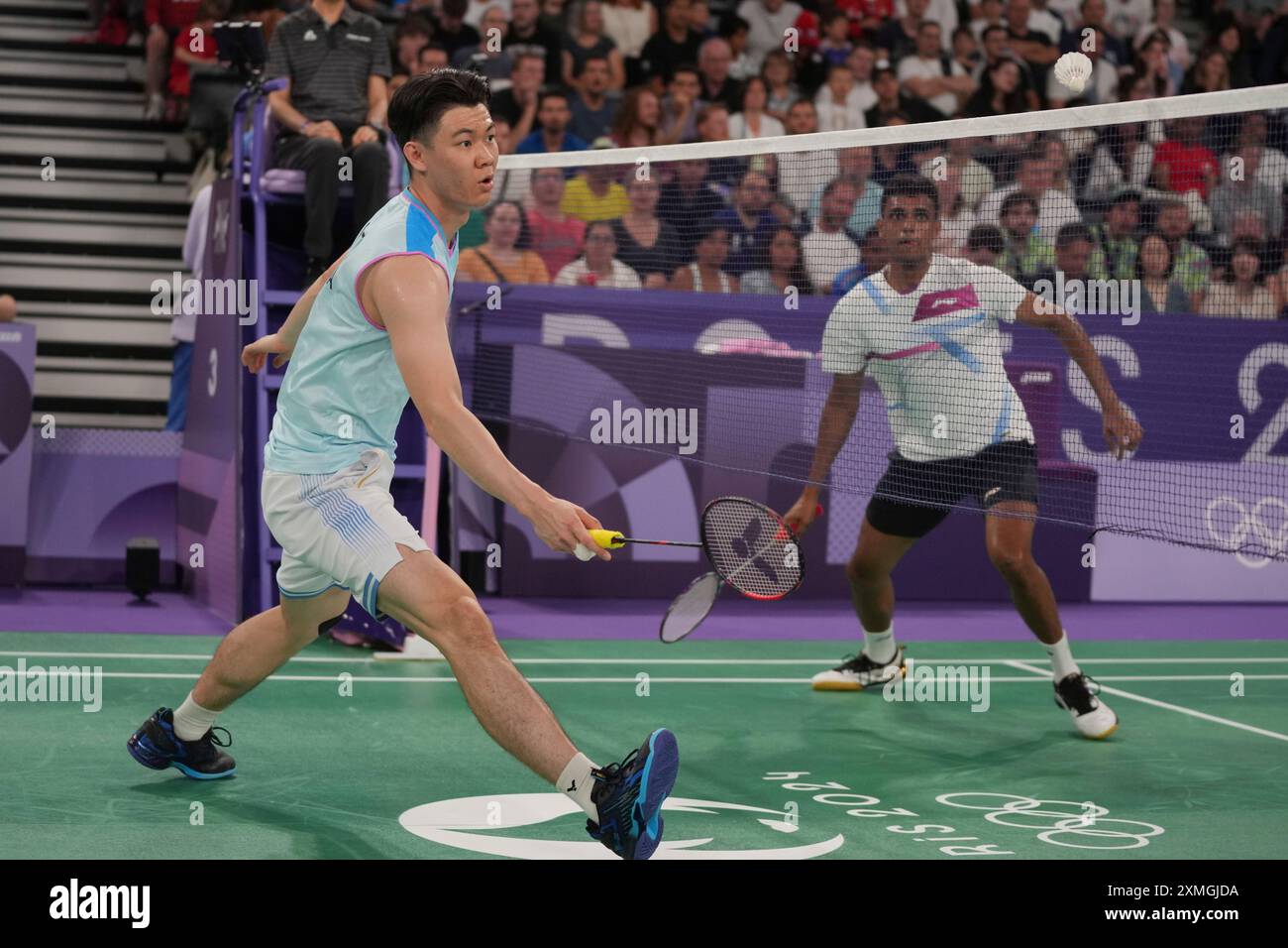 Malaysia's Lee Zii Jia, left, plays against Sri Lanka's Viren Sri ...