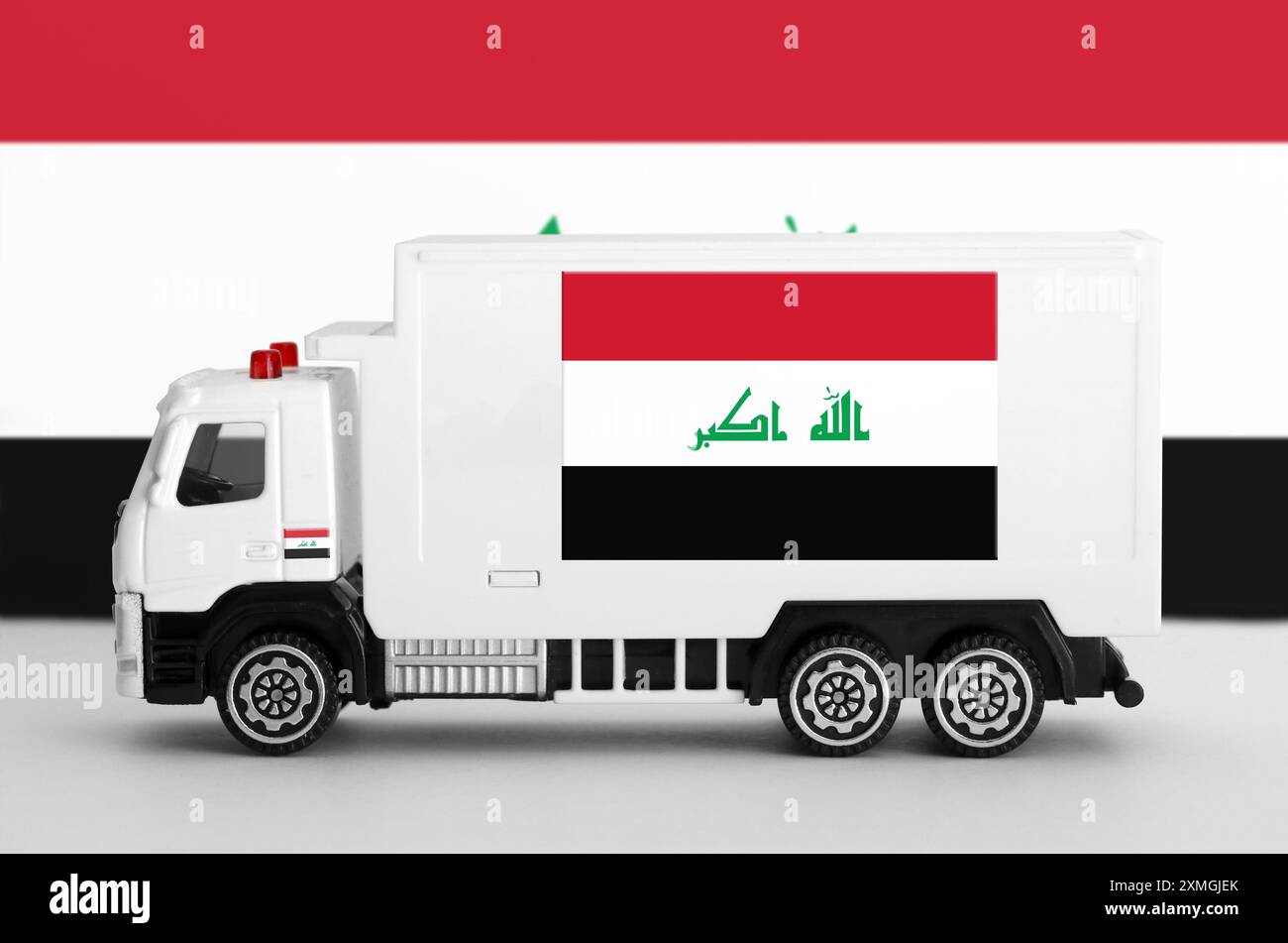 Iraq flag depicted on side wall of white delivery van close up ...