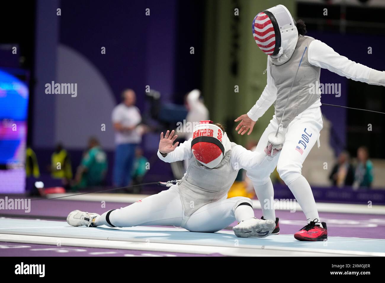 Singapore's Amita Berthier and United States' Lauren Scruggs compete in ...