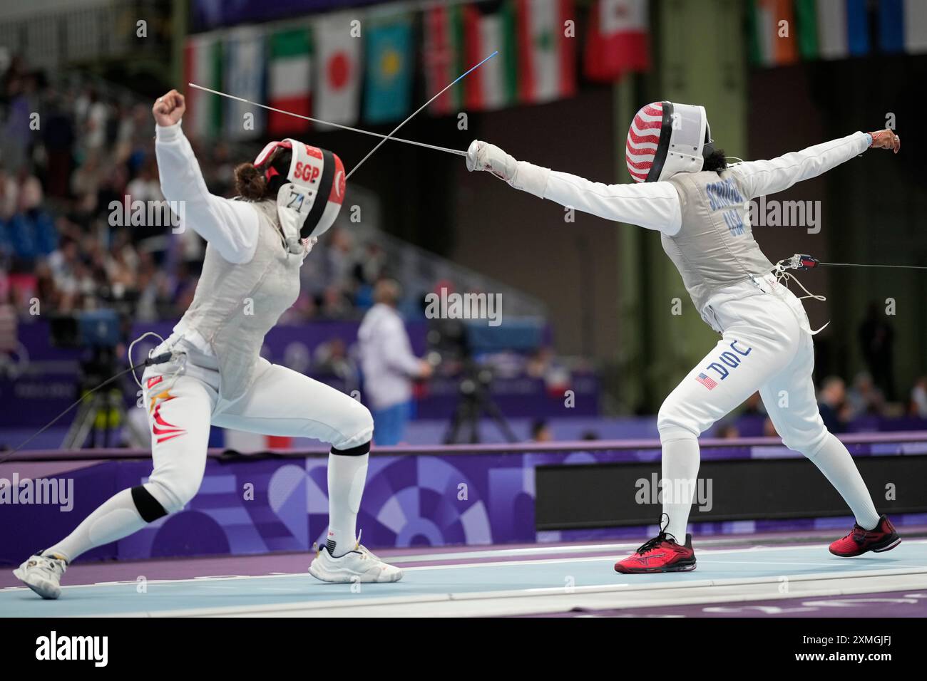 Singapore's Amita Berthier and United States' Lauren Scruggs compete in ...