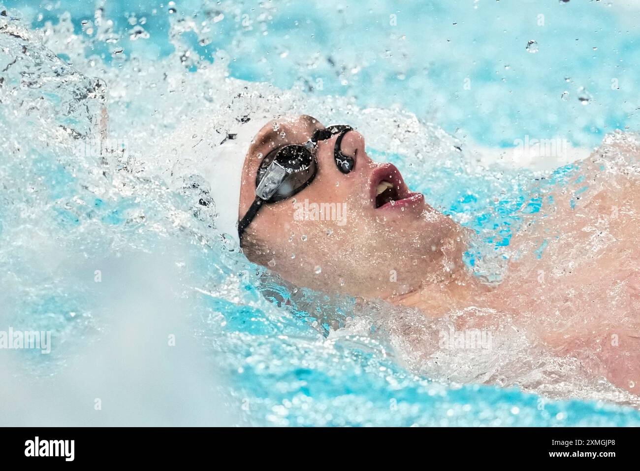 Hunter Armstrong, of the United States, competes during a heat in the ...