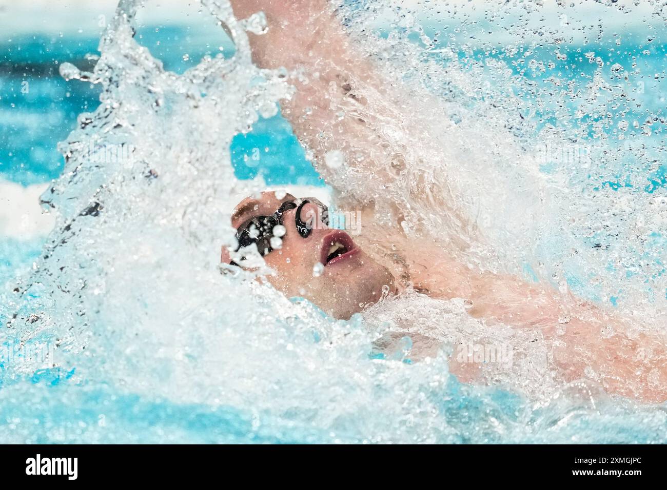 Hunter Armstrong, of the United States, competes during a heat in the ...