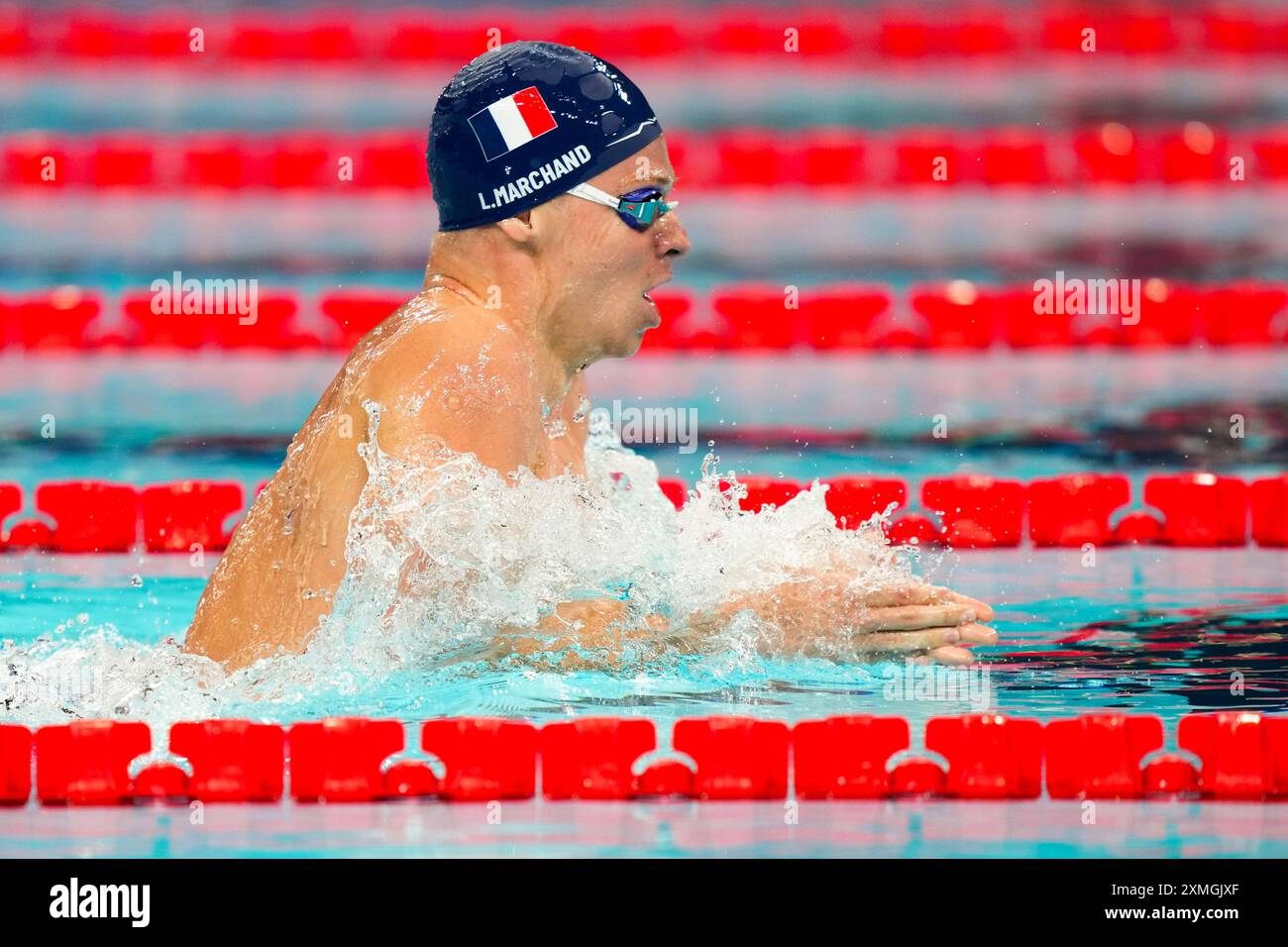Leon Marchand, of France, competes during a heat in the men's 400-meter ...