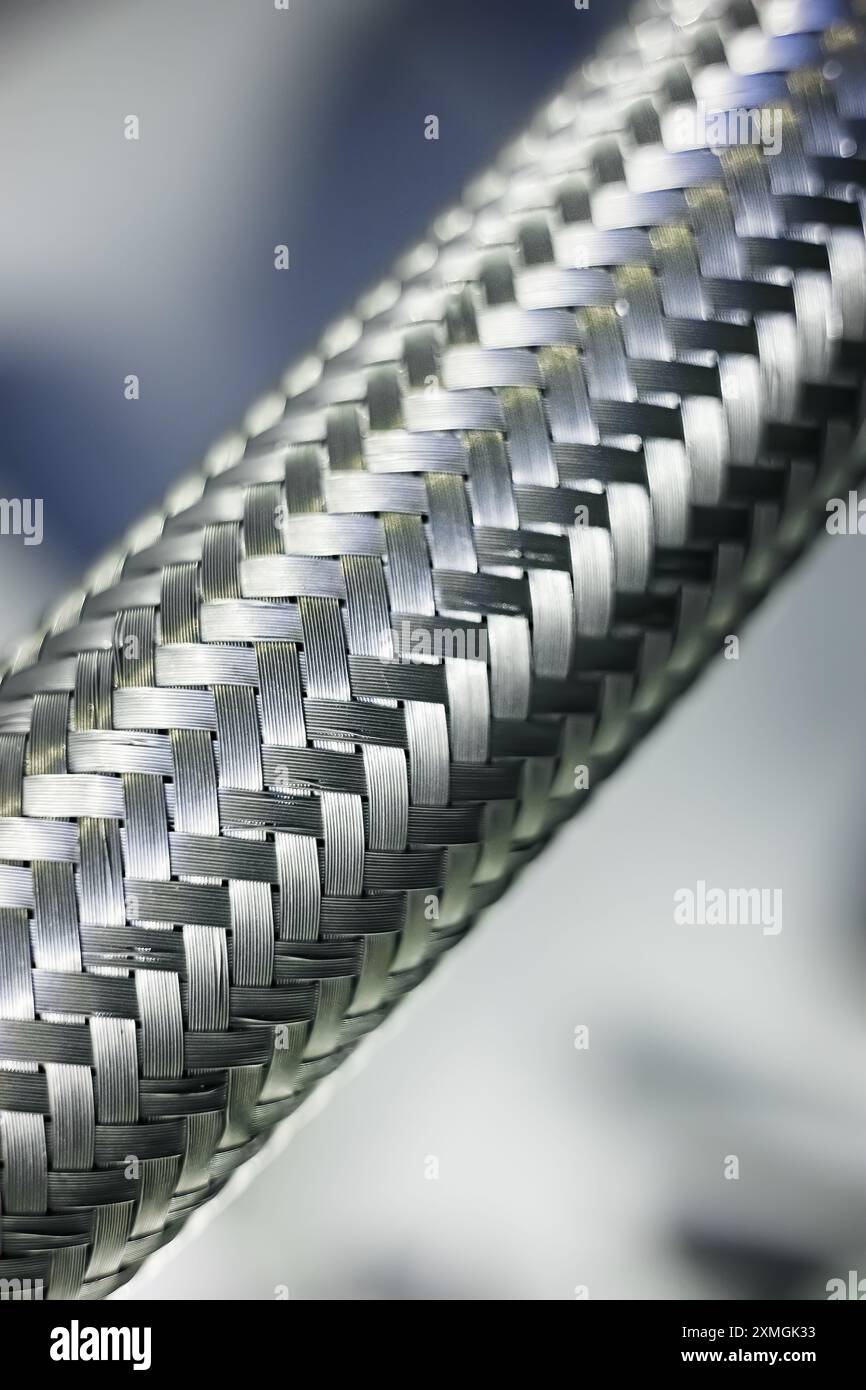 Reinforced hose with steel wire texture hydroline Stock Photo - Alamy