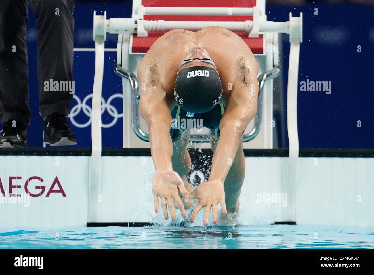 Thomas Ceccon, of Italy, competes during a heat in the men's 100-meter ...