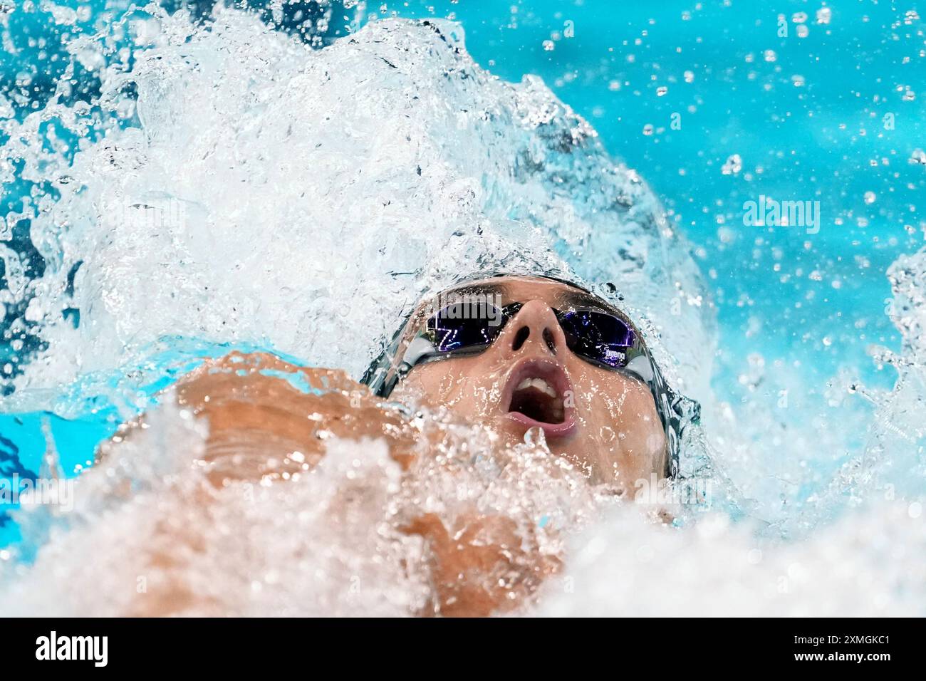 Thomas Ceccon, of Italy, competes during a heat in the men's 100-meter ...