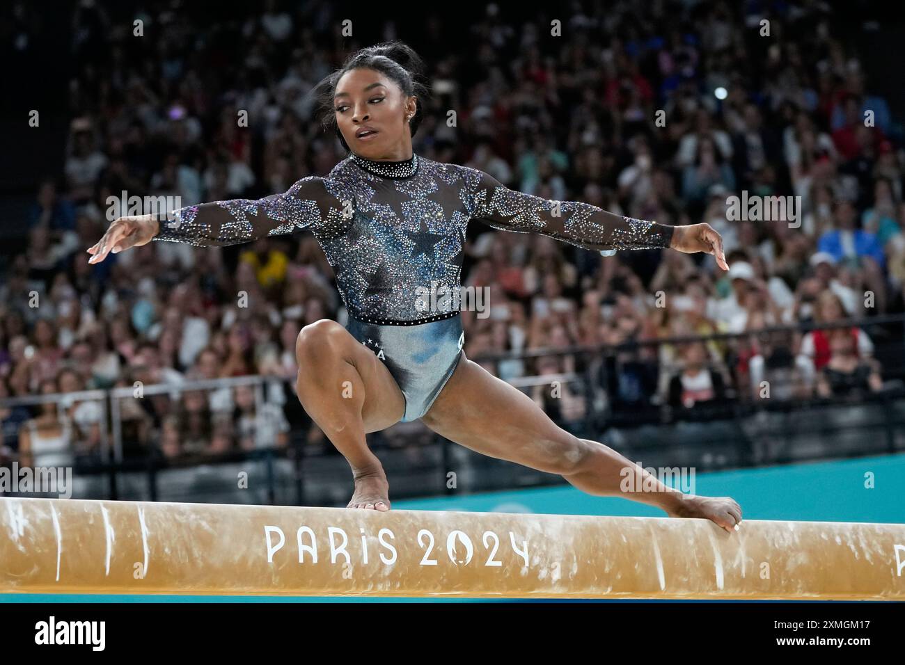Simone Biles of the United States competes on the balance beam during a ...
