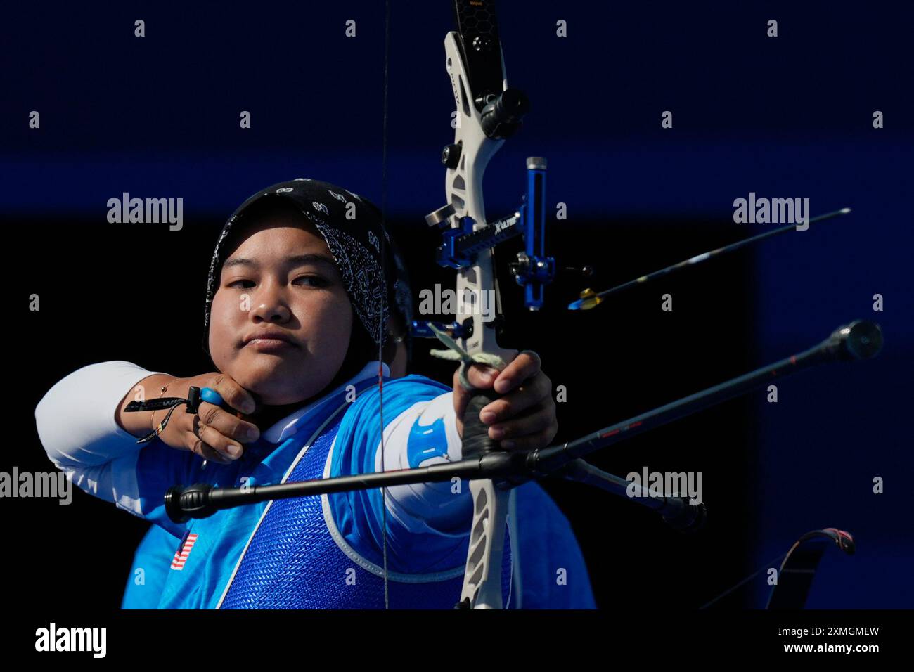 Malaysia's Syaqiera Mashayikh fires in the women's team archery ...