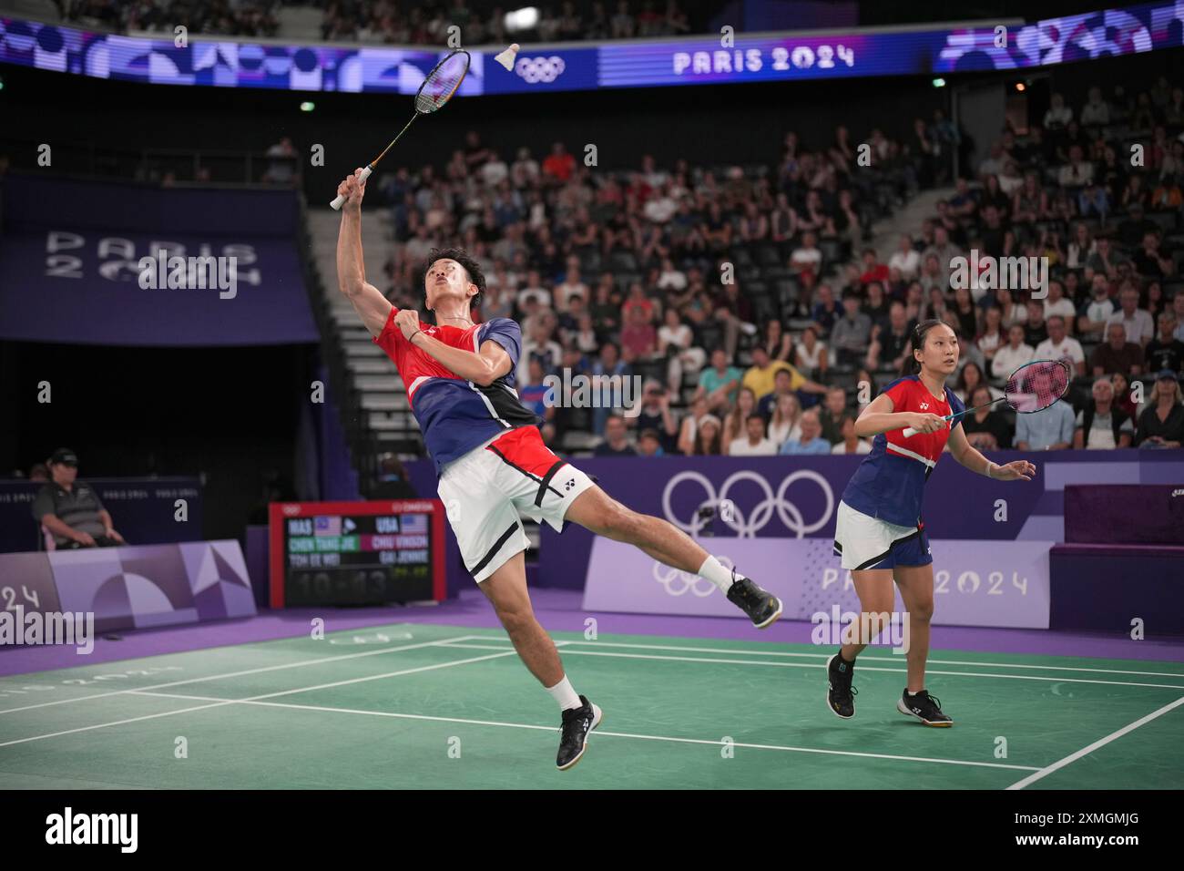United States' Vinson Chiu, left, and Jennie Gai play against Malaysia ...
