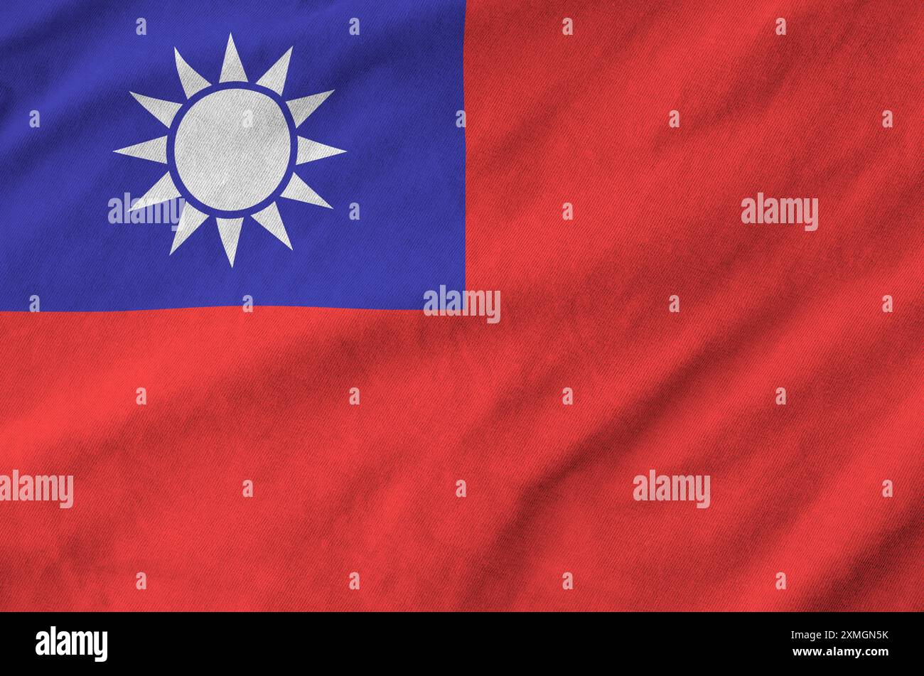 Taiwan flag depicted on folded wavy fabric of old cloth close up Stock ...