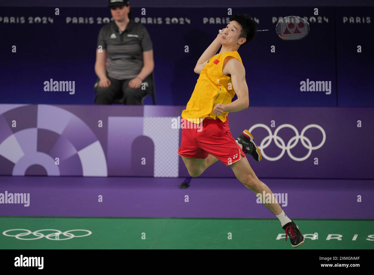 China's Li Shi Feng plays against Switzerland's Tobias Kuenzi badminton ...