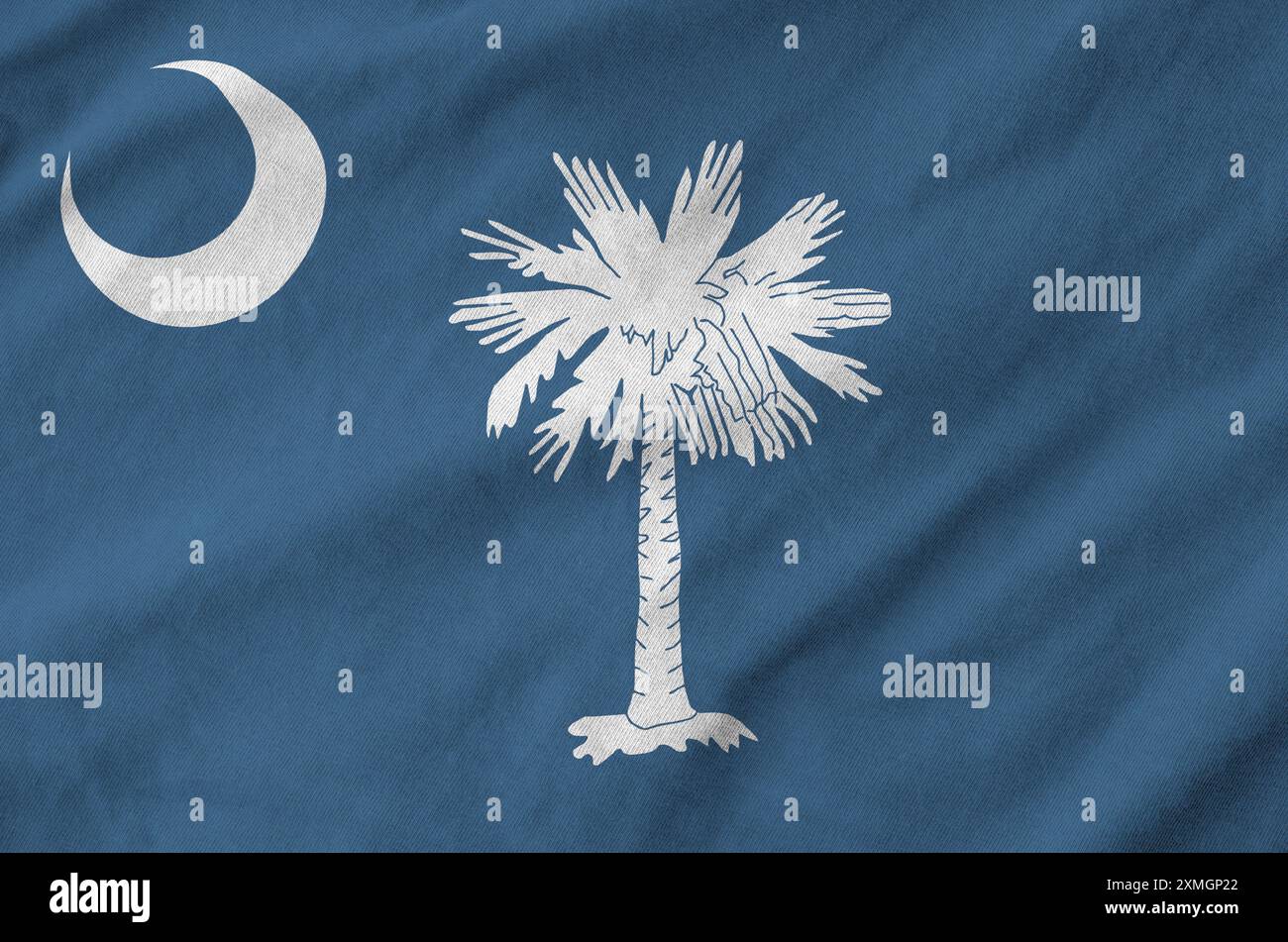 South Carolina US state flag depicted on folded wavy fabric of old ...