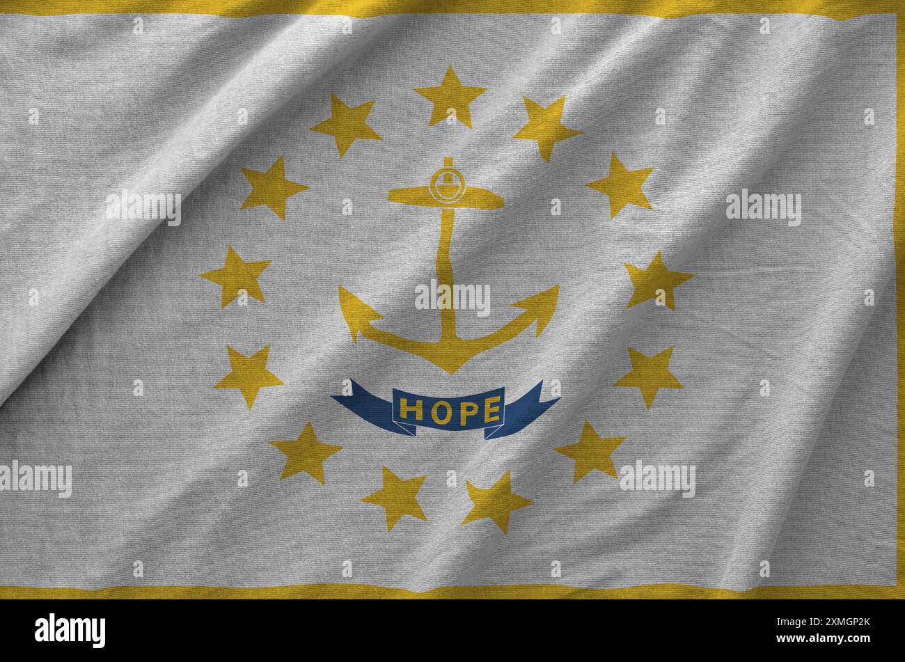 Rhode Island US state flag depicted on folded wavy fabric of old cloth ...