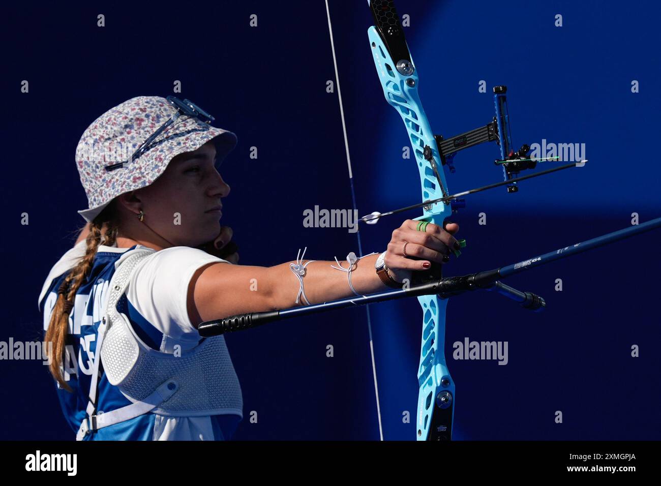 France's Lisa Barbelin releases her arrow in the women's team archery ...