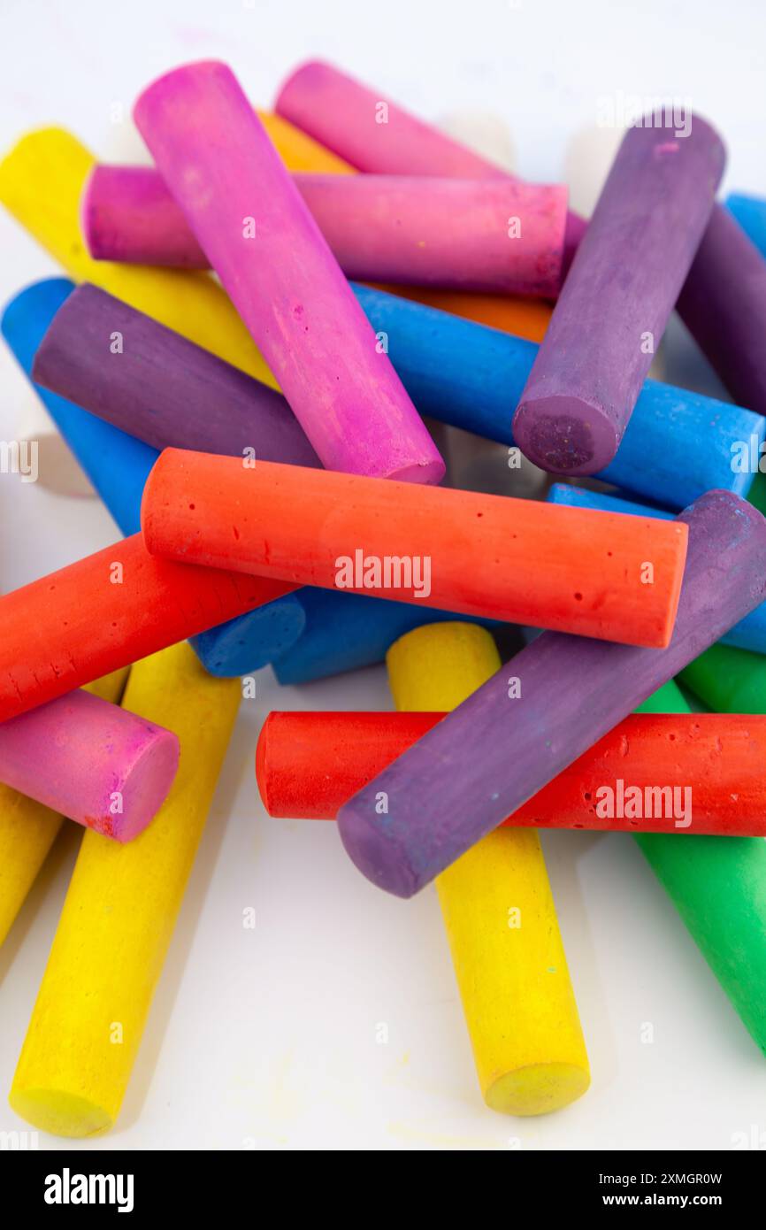 Set of colorful chalks for the board and the street. Drawing chalk ...