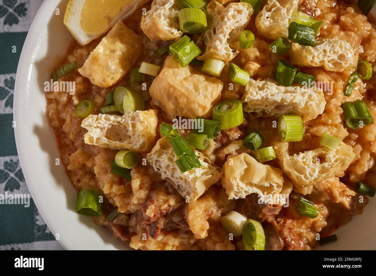 Arroz Caldo, a rice soup from the Philippines Stock Photo - Alamy