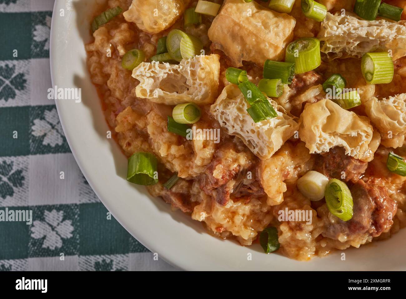 Arroz Caldo, a rice soup from the Philippines Stock Photo - Alamy