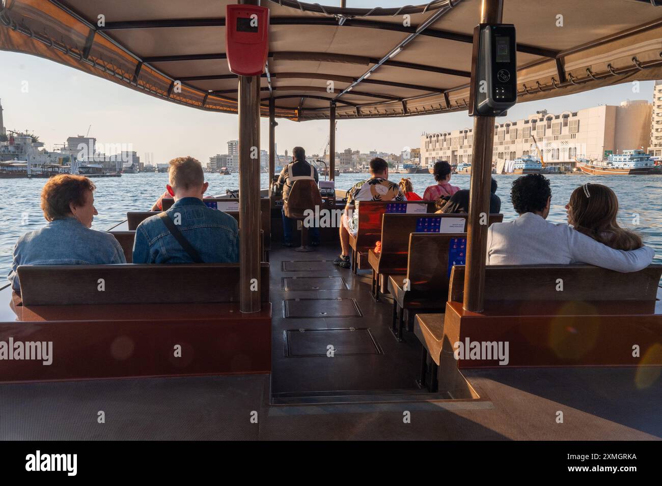 Dubai, United Arab Emirates – January 5, 2024: People ride an abra, a ...