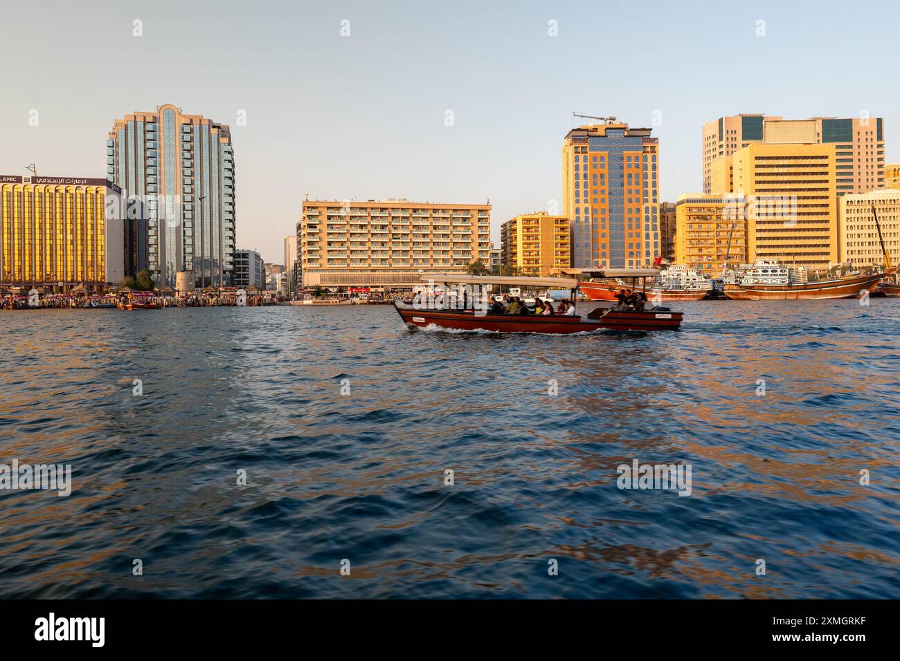 Dubai, United Arab Emirates – January 5, 2024: People ride an abra, a ...