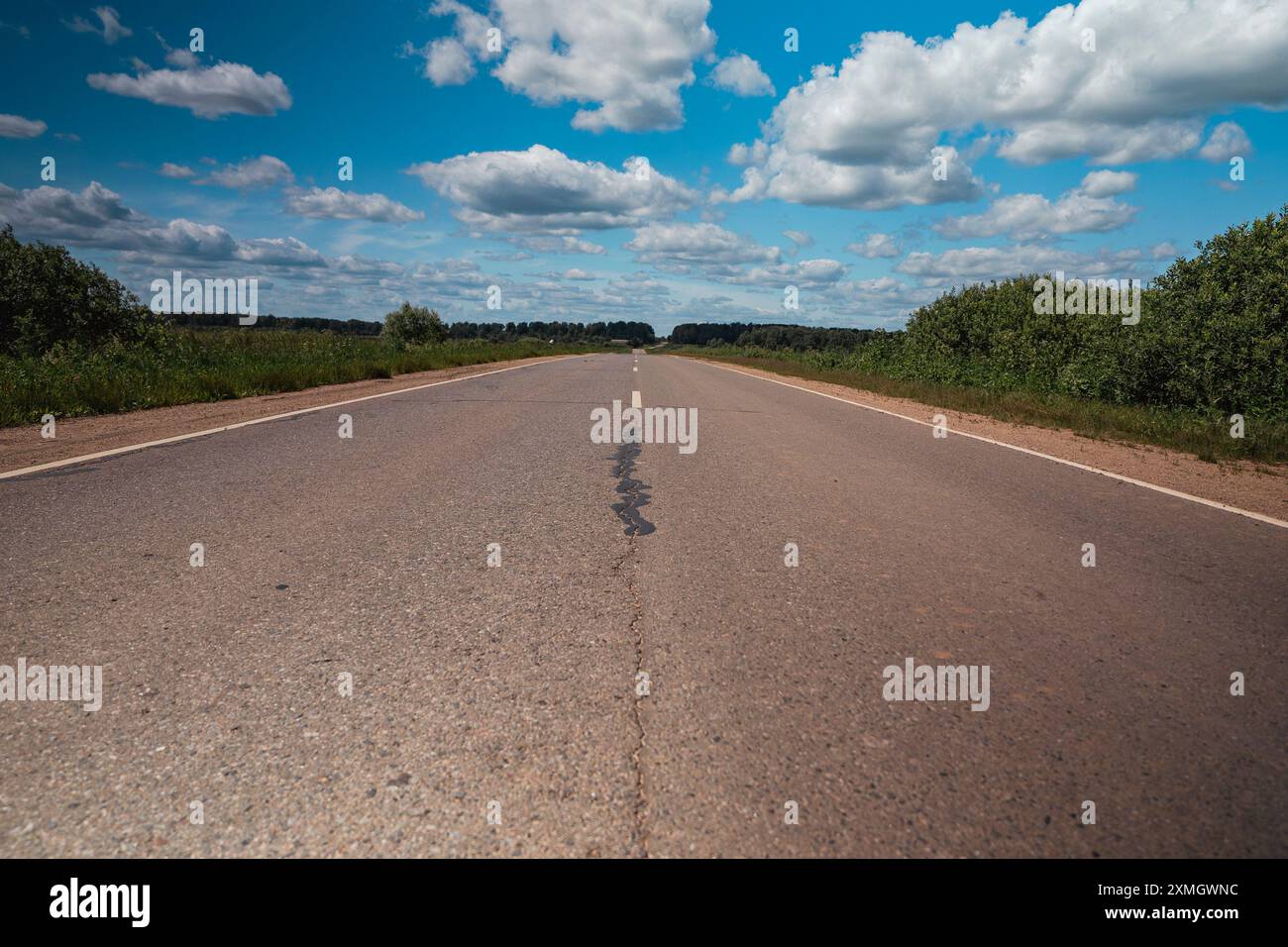 Peaceful country road stretches under hi-res stock photography and ...