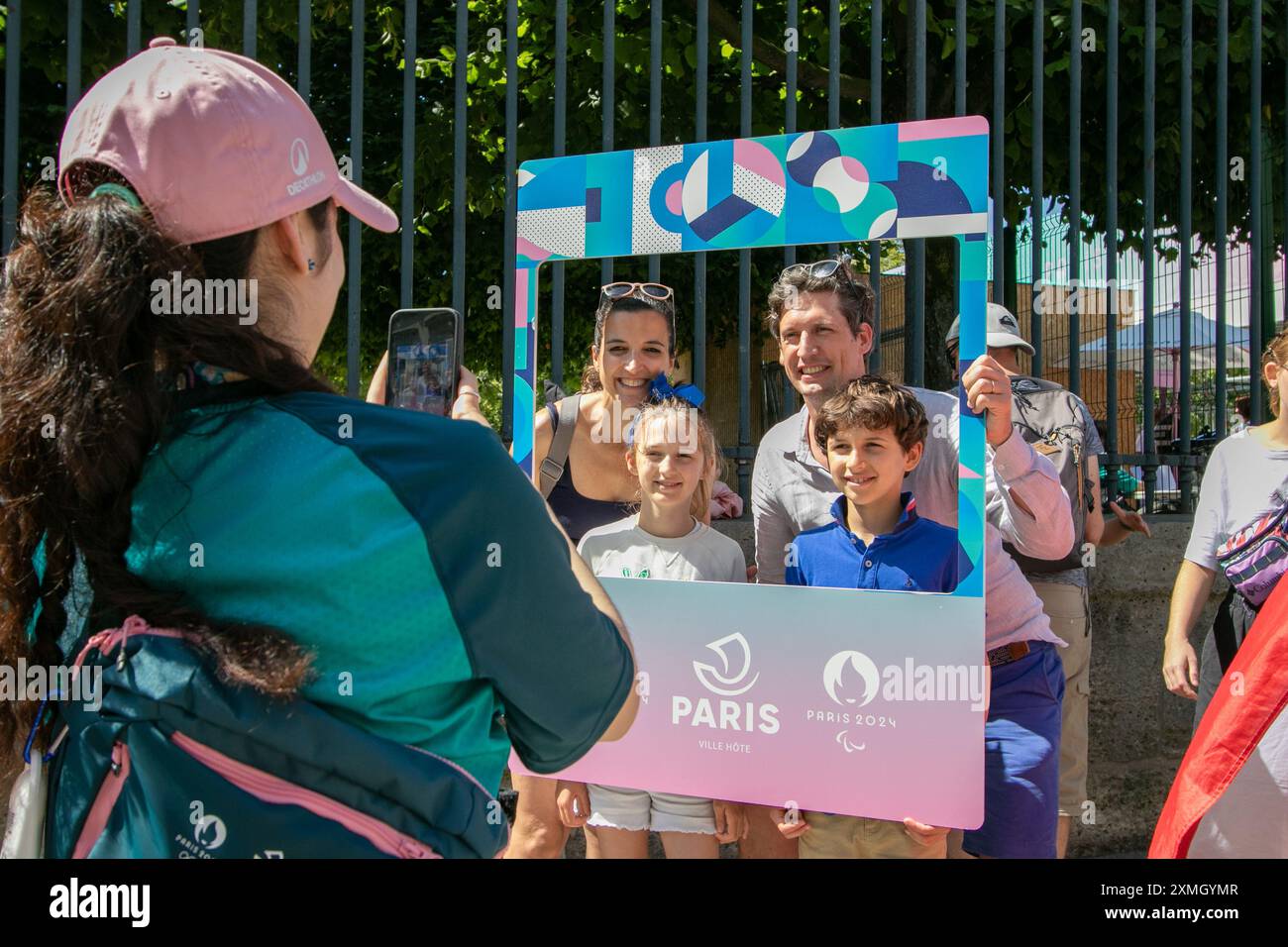 July 28, 2024, Tokyo, Kanto, Japan: Fans take a photo with a 2024 Paris ...